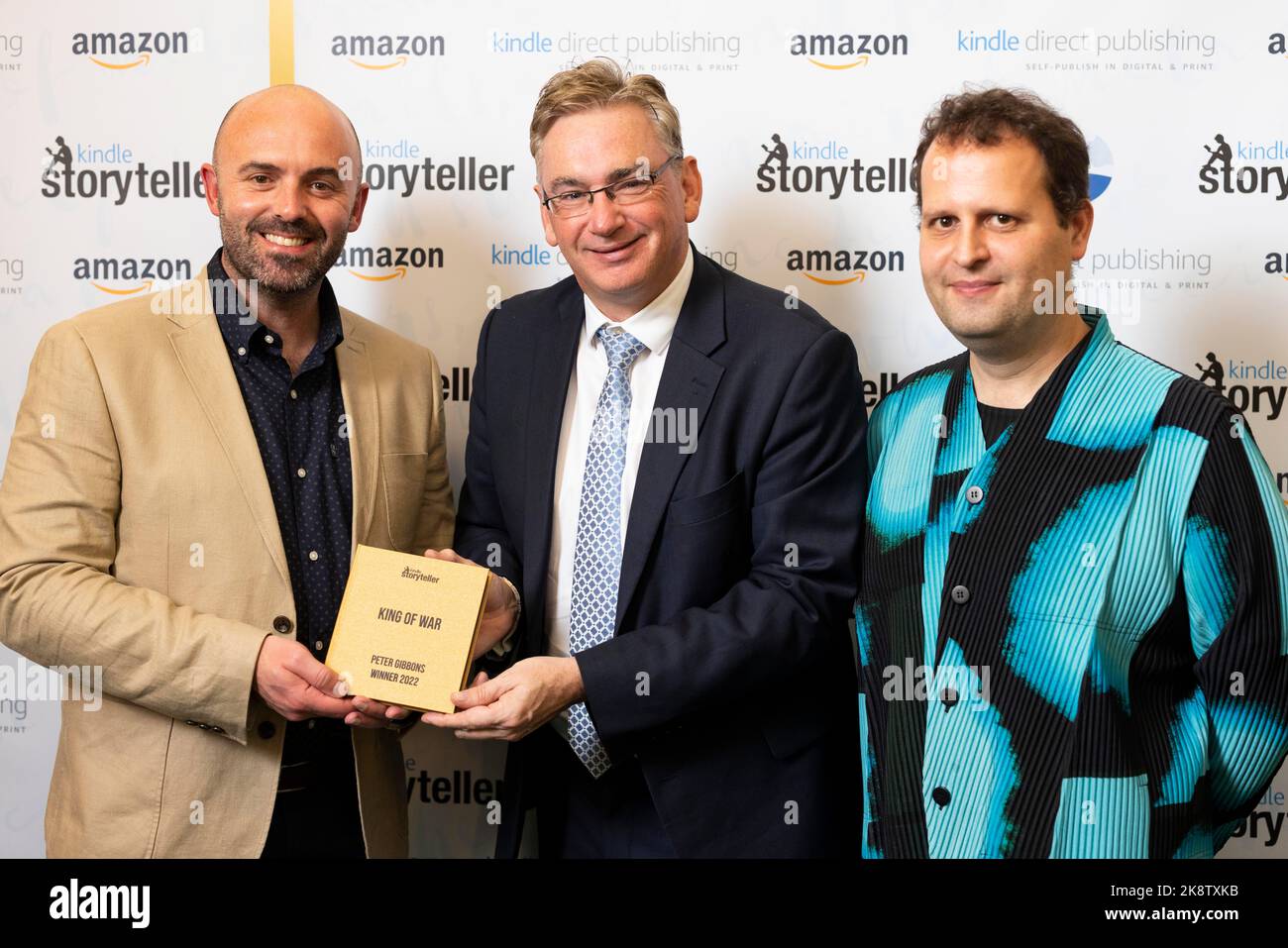 EDITORIAL USE ONLY Peter Gibbons, (left), winner of the Kindle ...