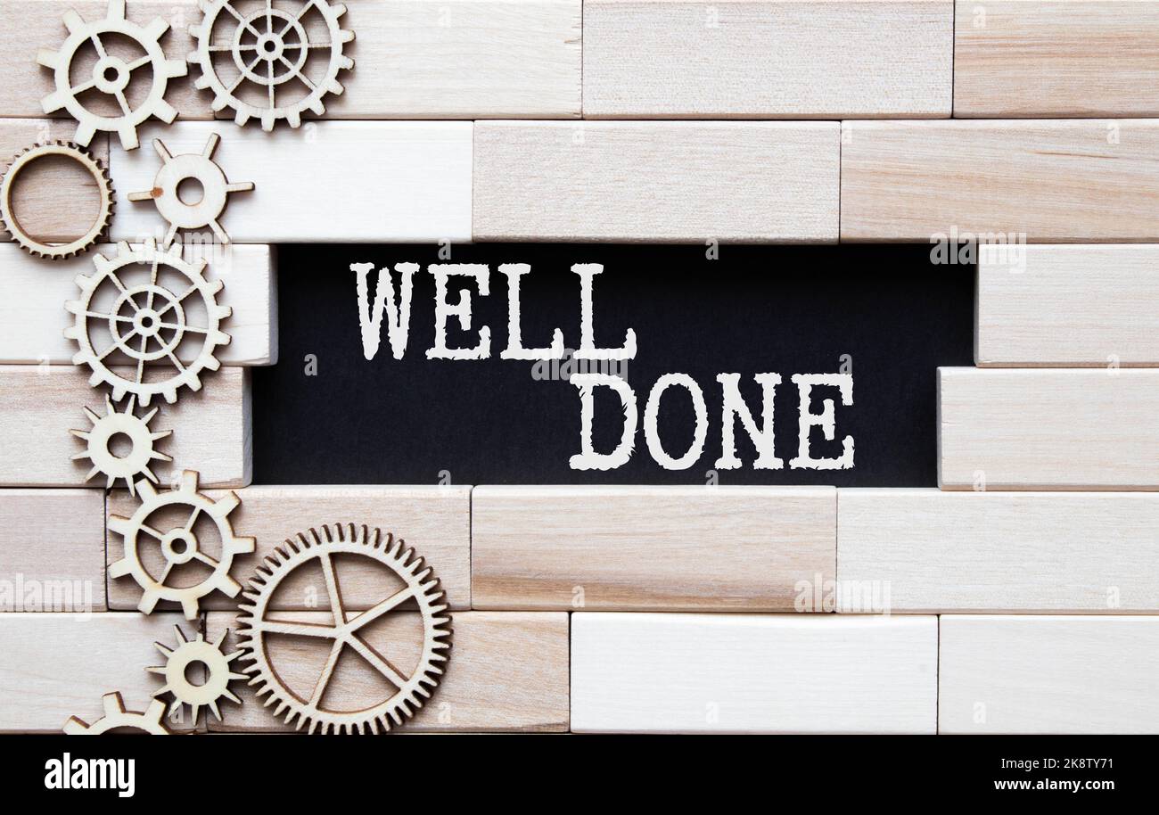 Text well done on the short note texture background Stock Photo - Alamy