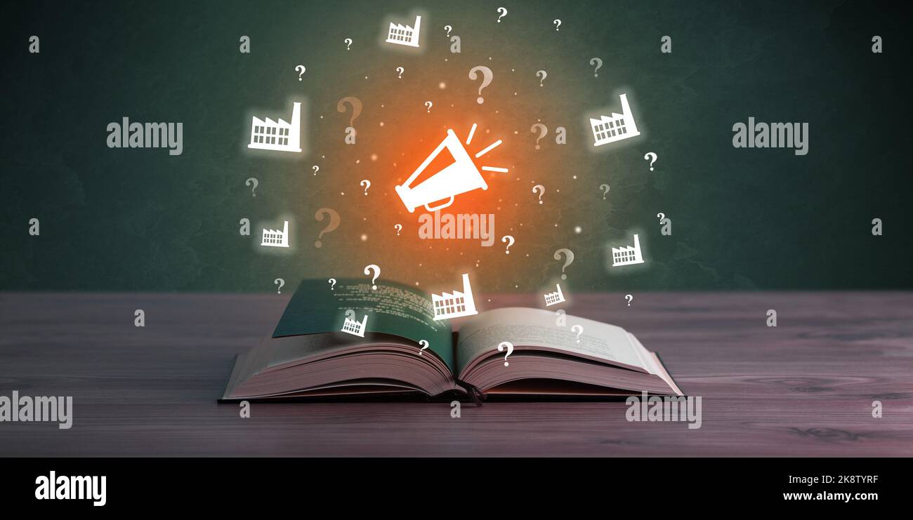 Open book with business icons above Stock Photo - Alamy