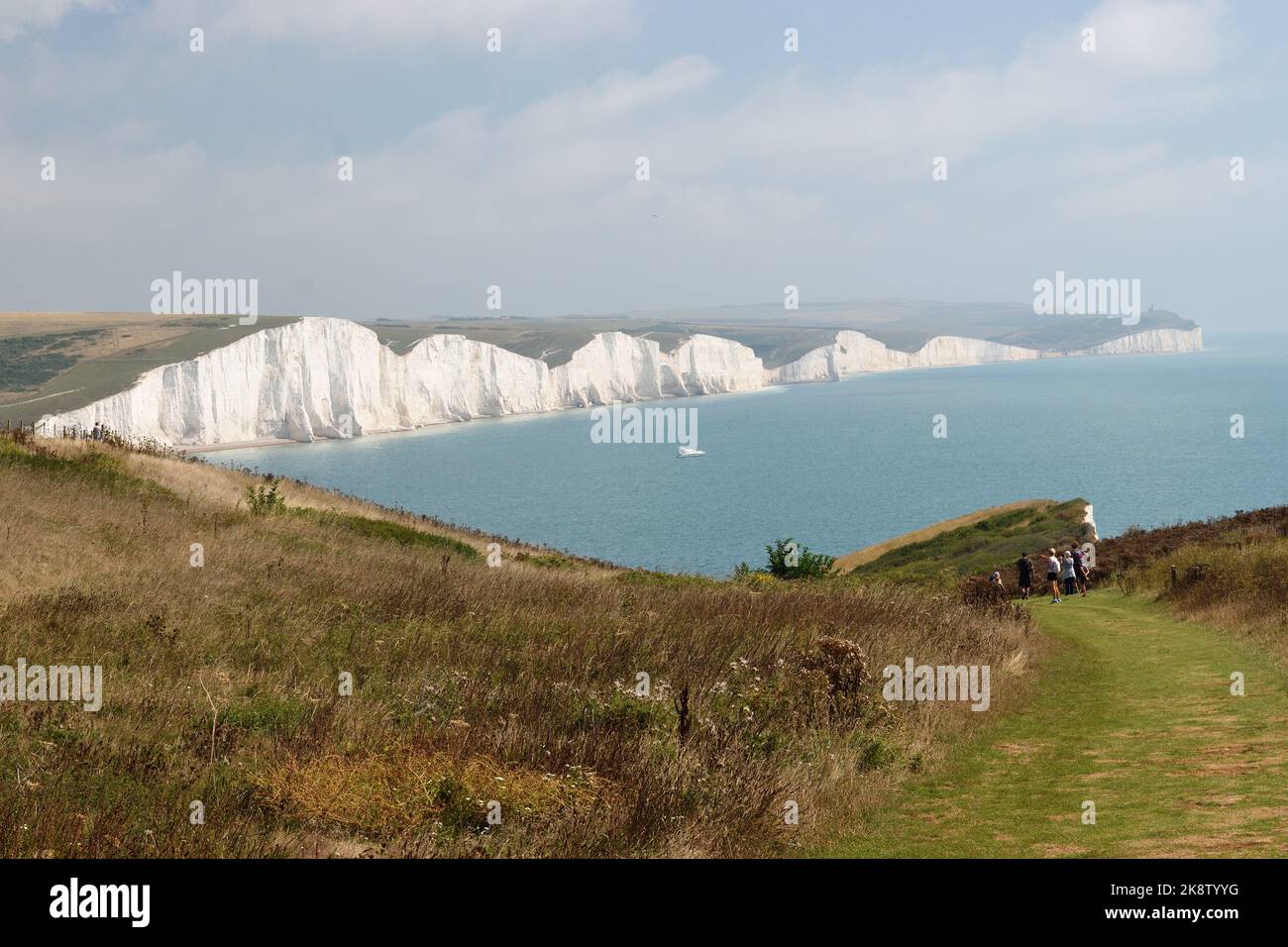 Seven Sisters cliffs from Seaford Head on the coastal path. East Sussex ...