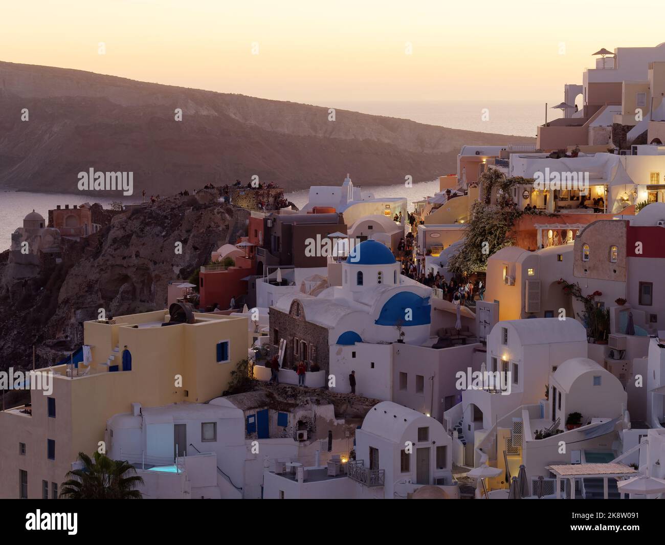 Town of Oia with its castle left blue domed churches and Caldera view ...