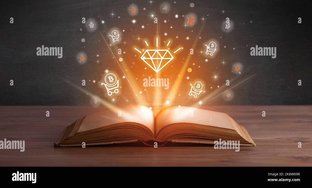 Open book with currency icons above Stock Photo - Alamy