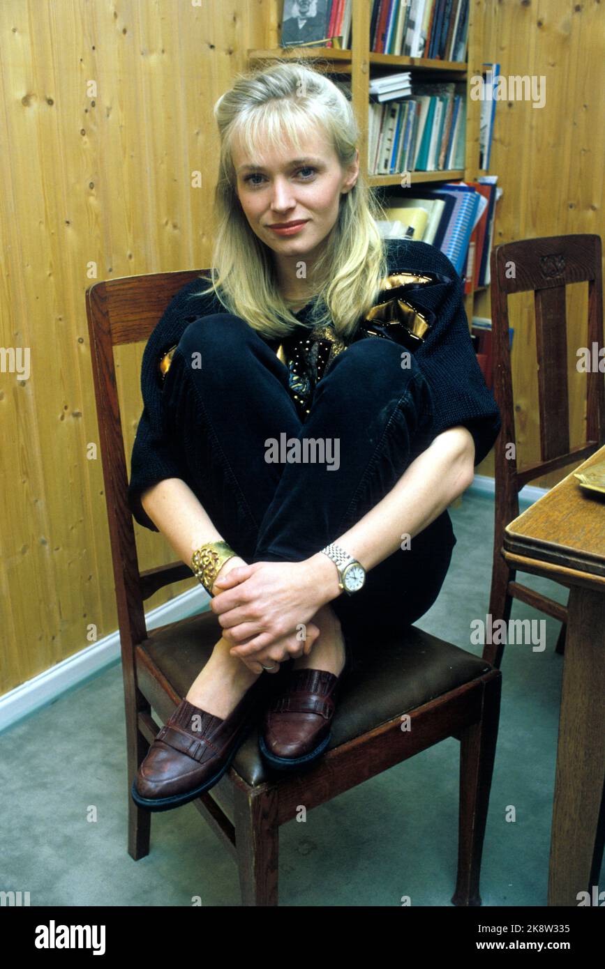 Oslo 19890105 Actress Linn Stokke. Sitting on a chair with the legs in ...