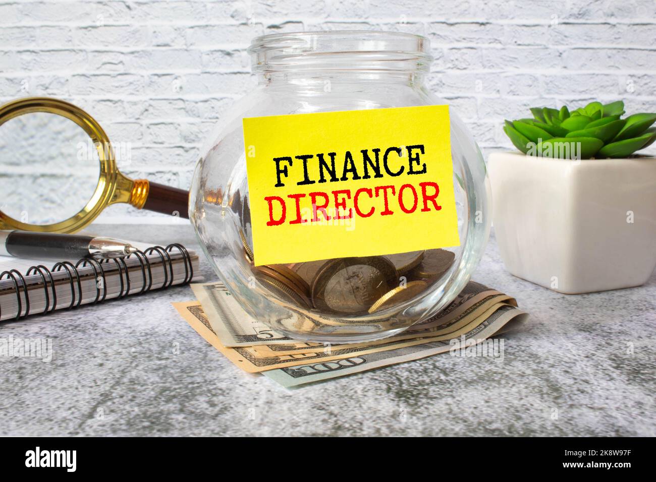 Closeup on card with text FINANCE DIRECTOR, business concept image with ...