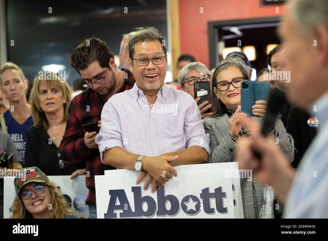 Austin, Texas, USA. 24th Oct, 2022. Voters listen as Texas Republican ...