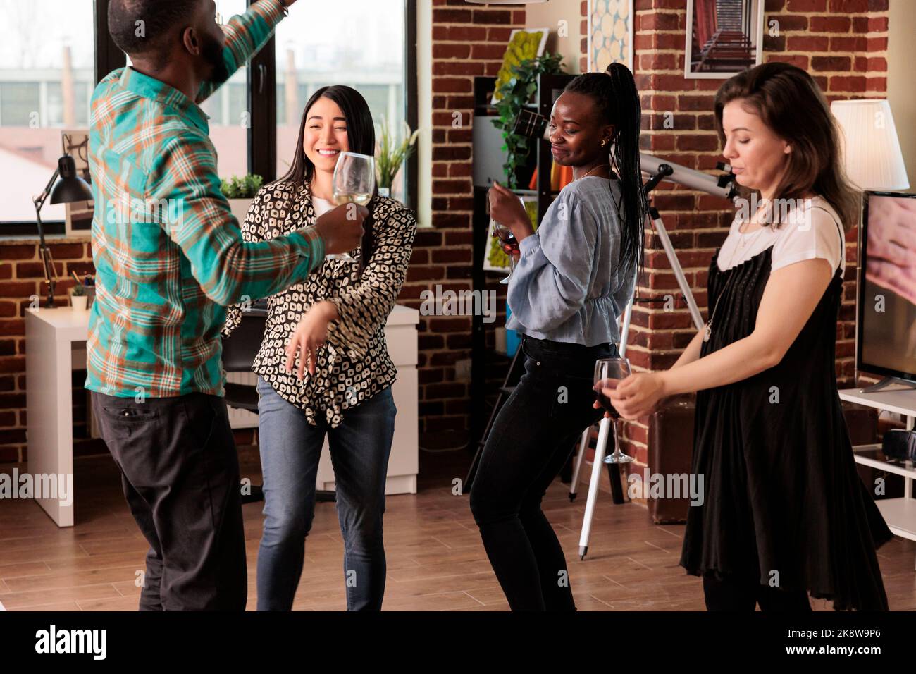 Happy multicultural friends hanging out together at joyfull partners ...