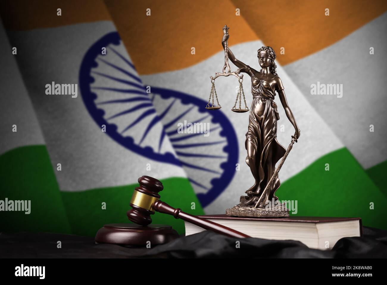 India flag with statue of lady justice, constitution and judge hammer ...