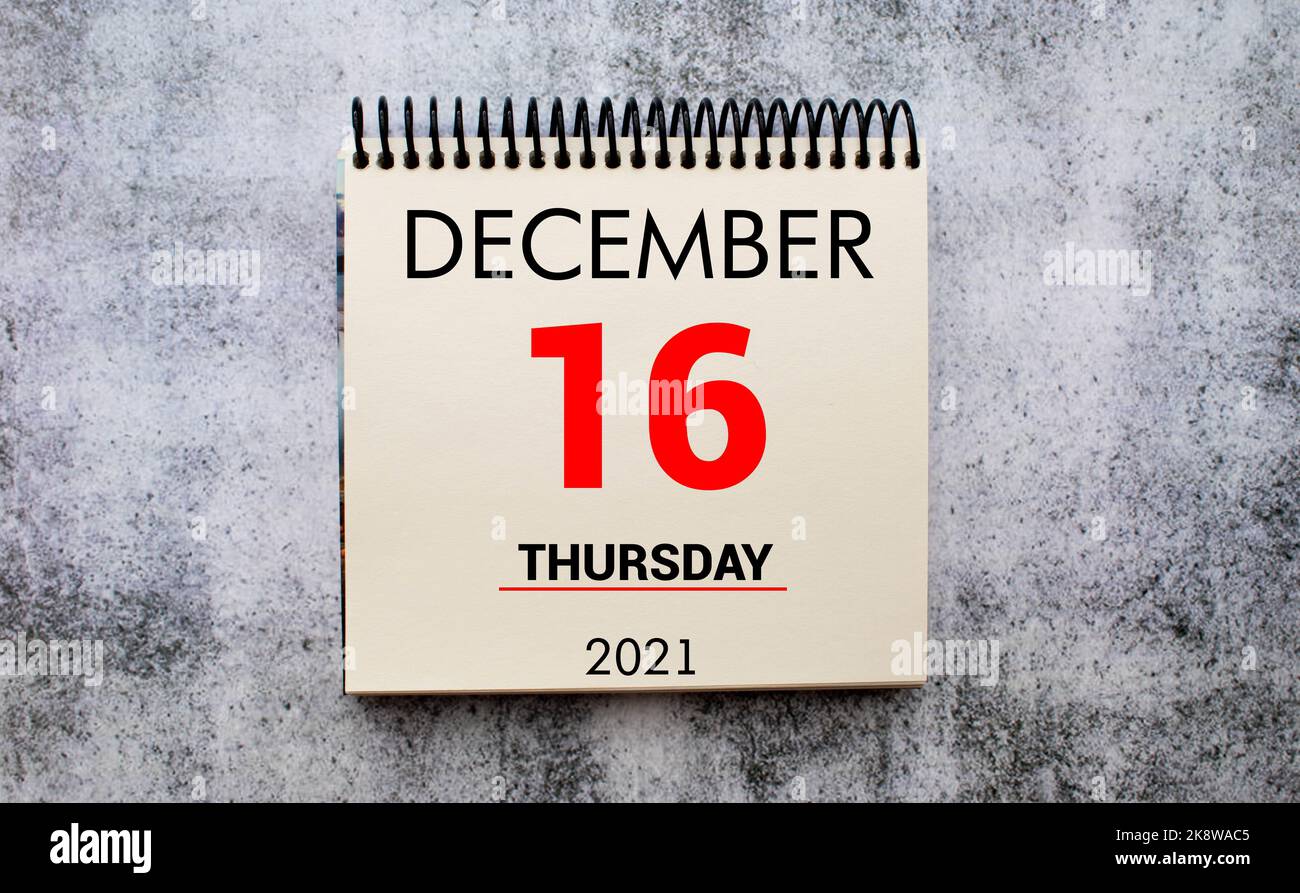 Save the Date written on a calendar - December 16 Stock Photo - Alamy