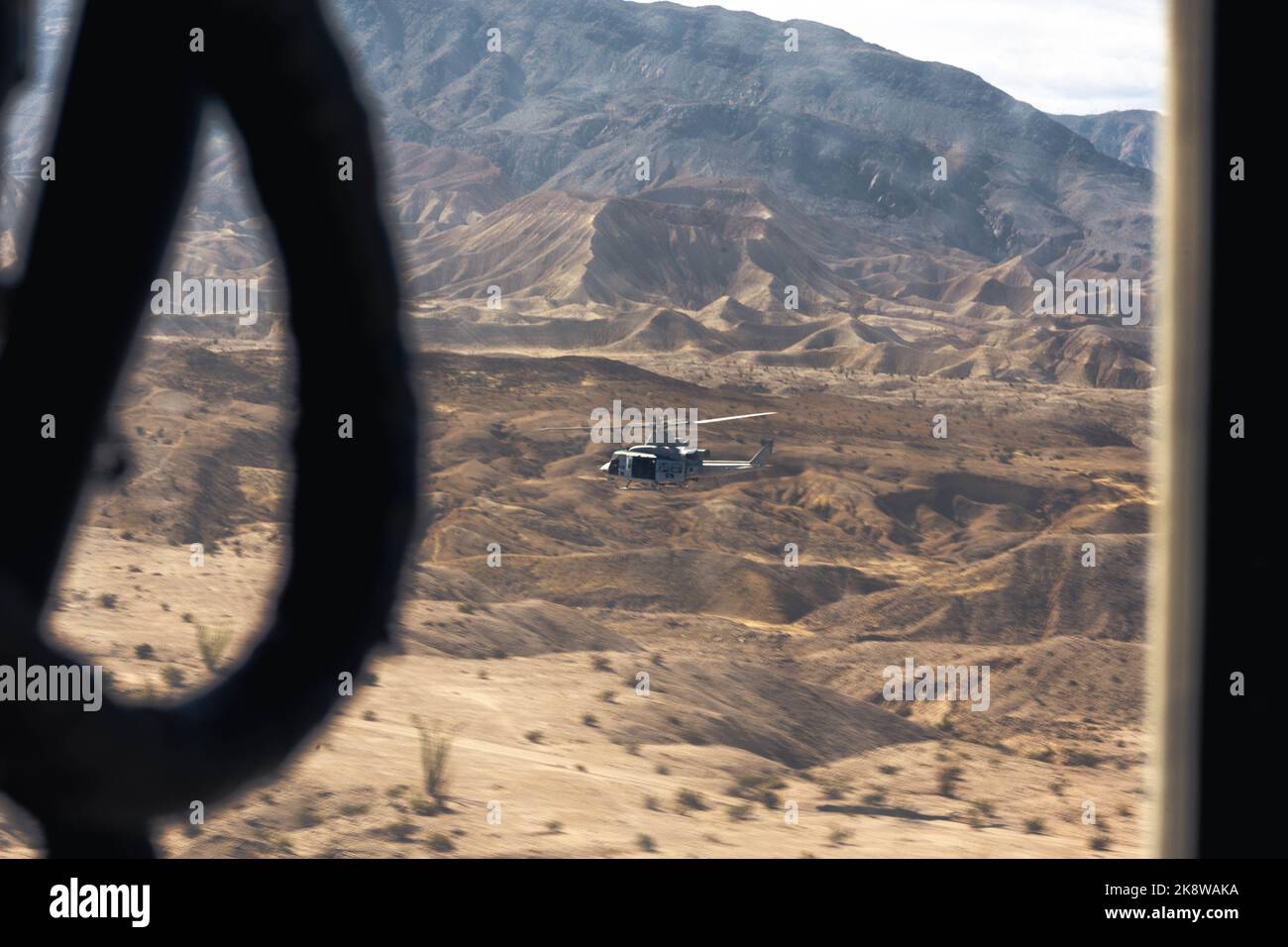 A UH-1Y Venom helicopter with Marine Light Attack Helicopter Training ...