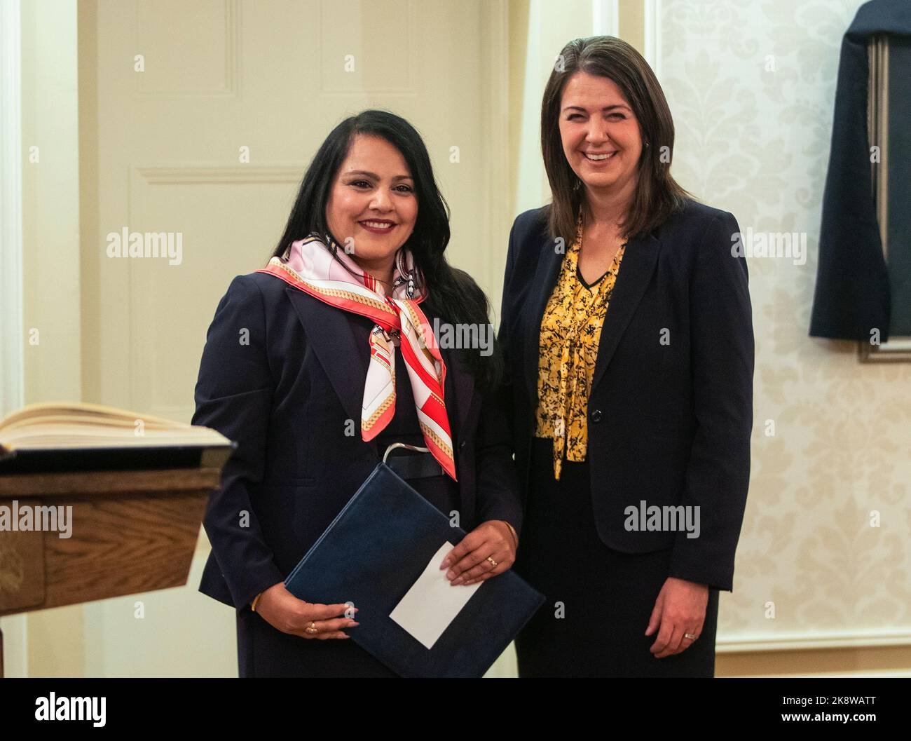 Rajan Sawhney stands with Alberta Premier Danielle Smith after Sawhney ...