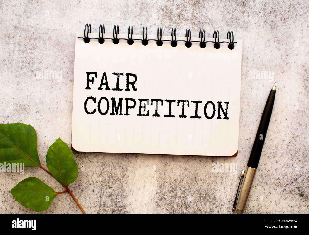 Fair treatment written under torn paper Stock Photo - Alamy