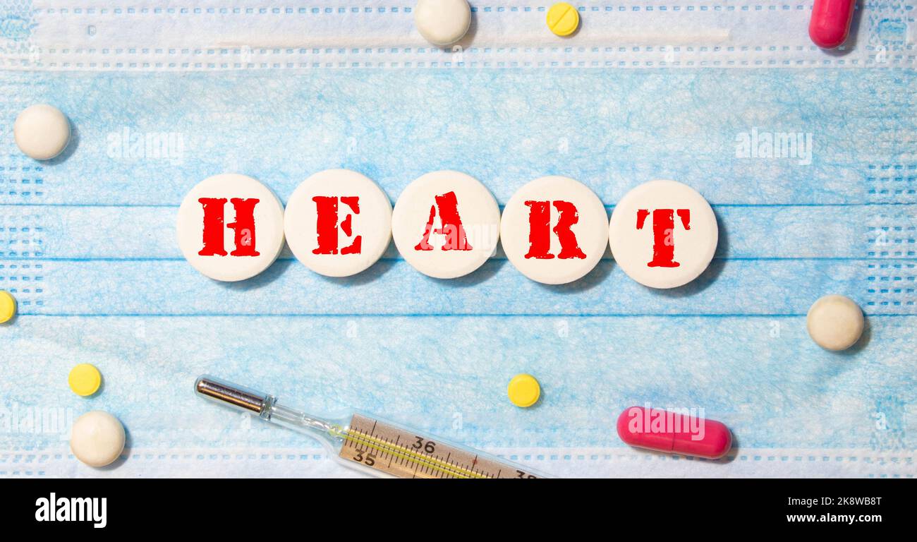 Heart or head symbol. Doctor turns wooden cubes and changes the word ...