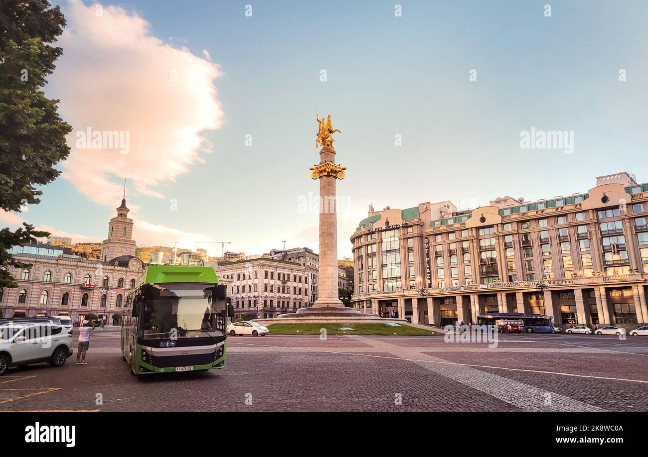 Tbilisi, Georgia - 07 23 2022: Green city bus coming from a roundabout ...