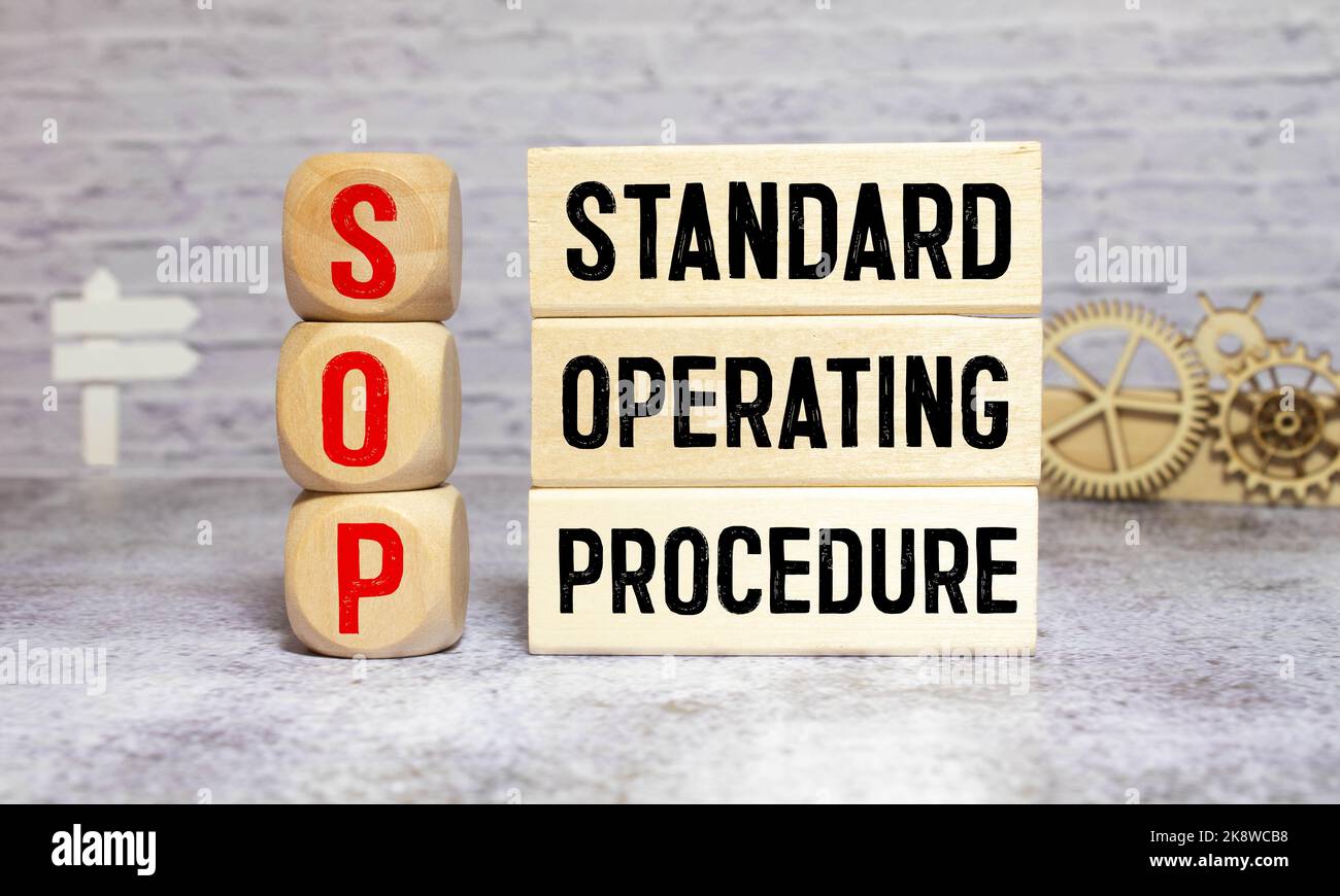 Standard Operating Procedure text on paper in open diary with ...