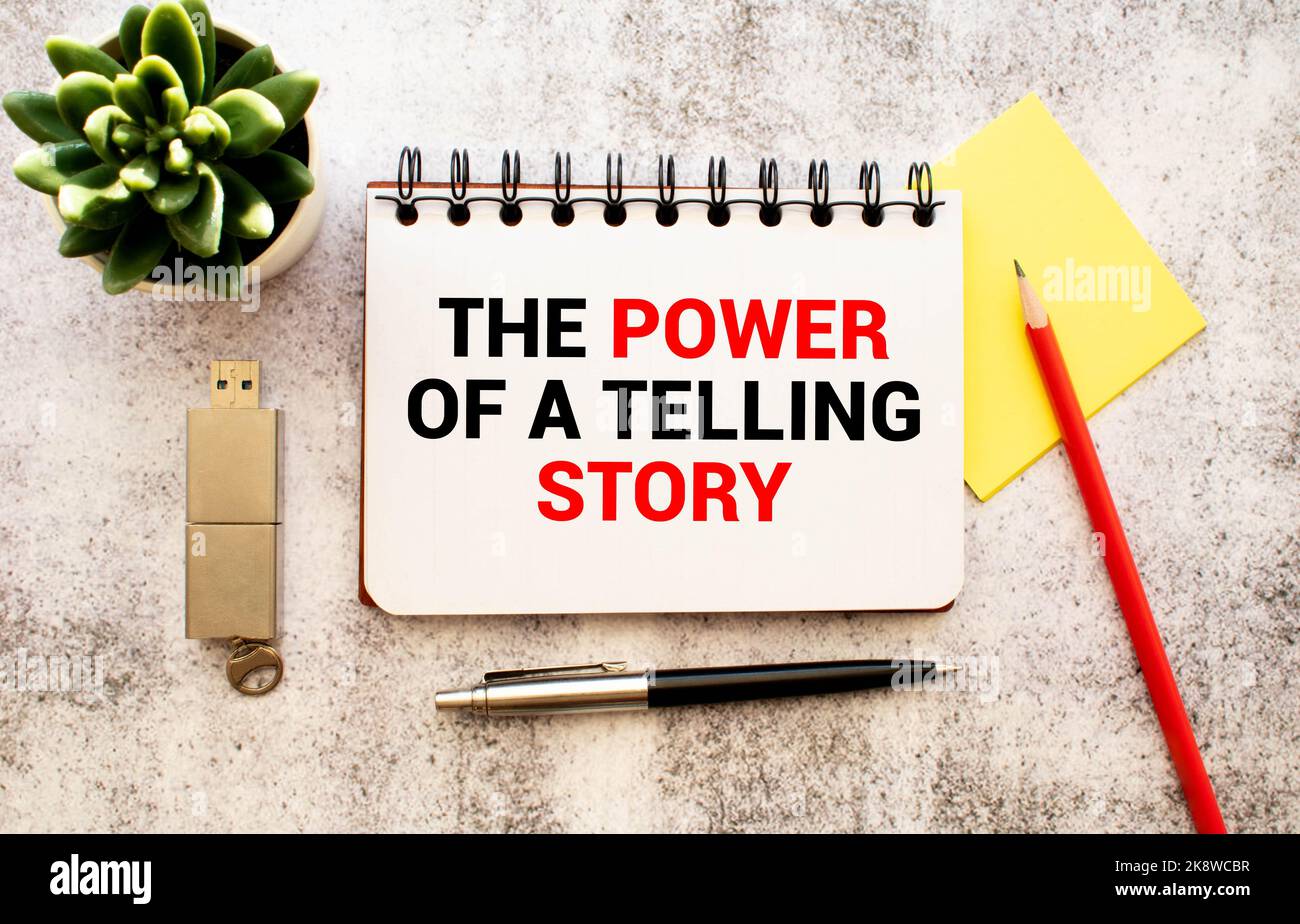 Paper plate with text THE POWER OF STORYTELLING. Diagram, calculator ...