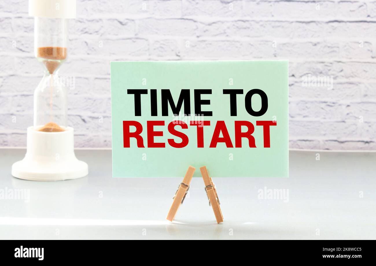 Financial diagram on white big notepad, green book and paper sheet with ...