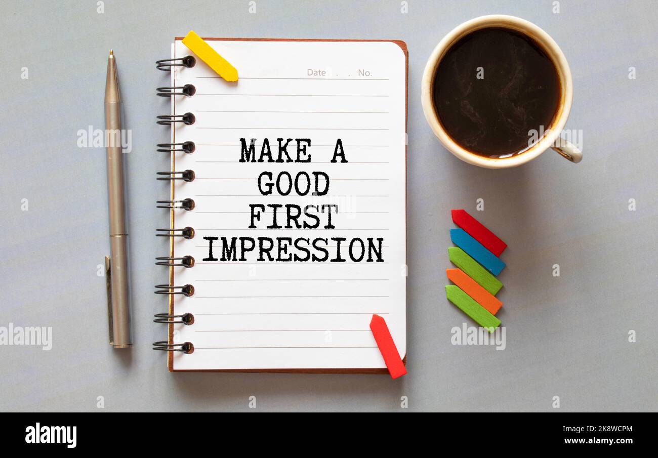 Text Make a good first impression on notebook page Stock Photo - Alamy