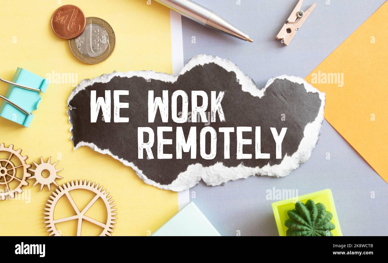 Work From Home, text in notepad with part of communication work tools ...