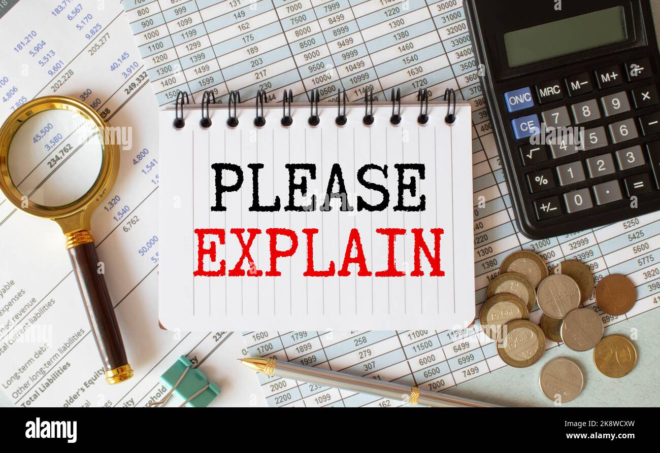 Keyboard of laptop, calcualtor, pencil and notepad with text PLEASE ...