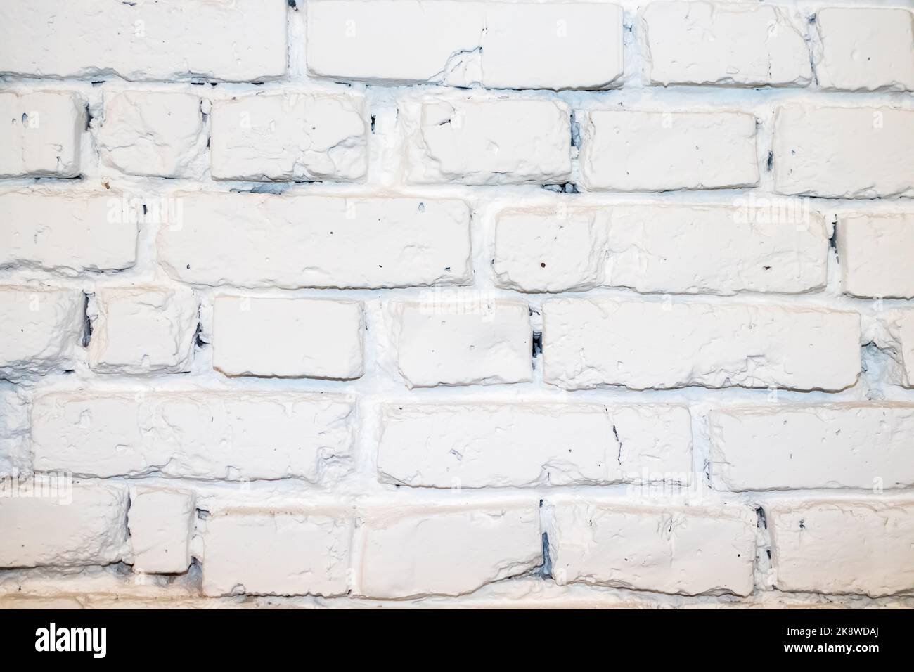 deep cracked white silicate brick wall closeup texture and background ...