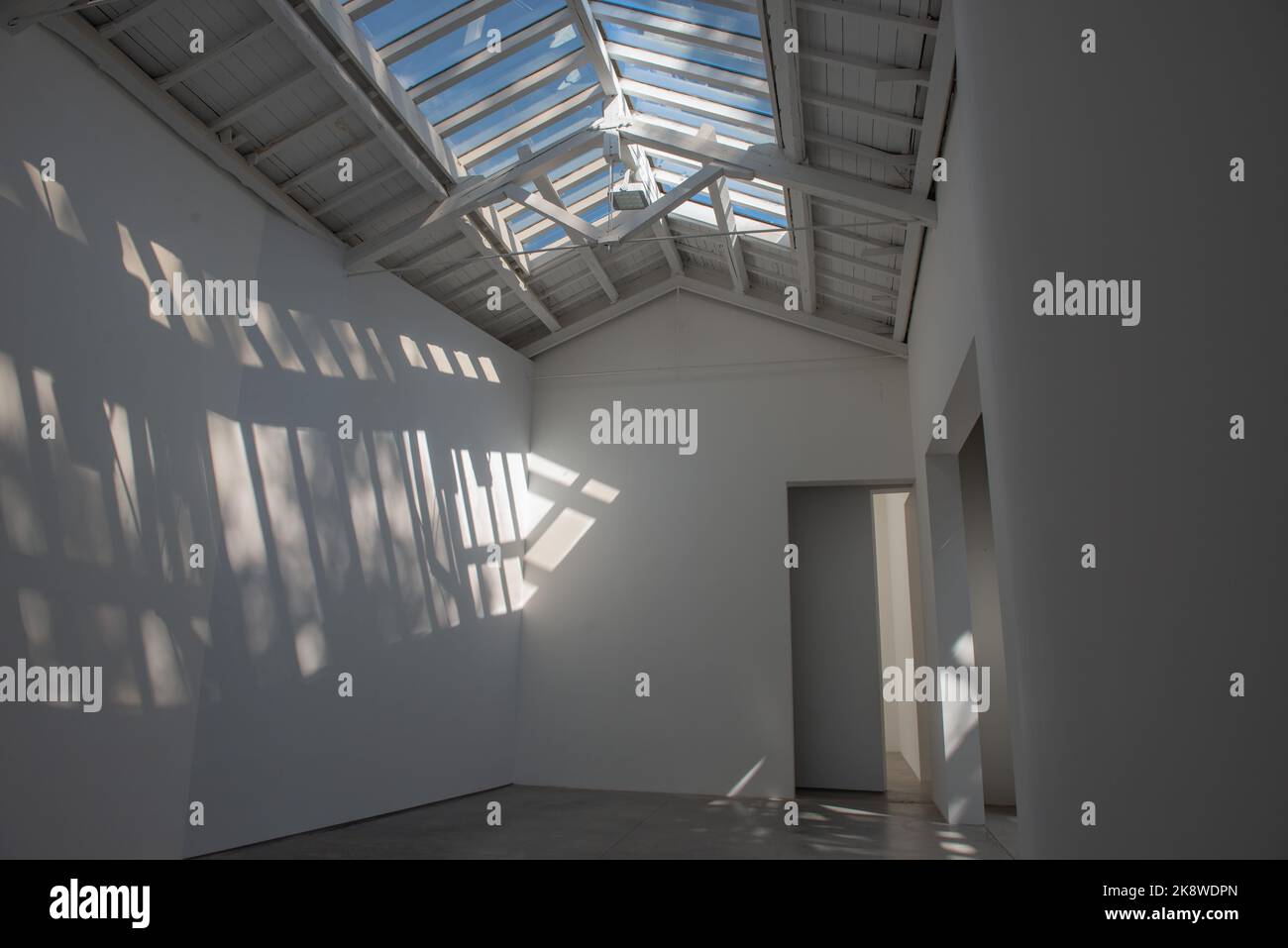 Room illuminated by the light entering through the skylight Stock Photo ...