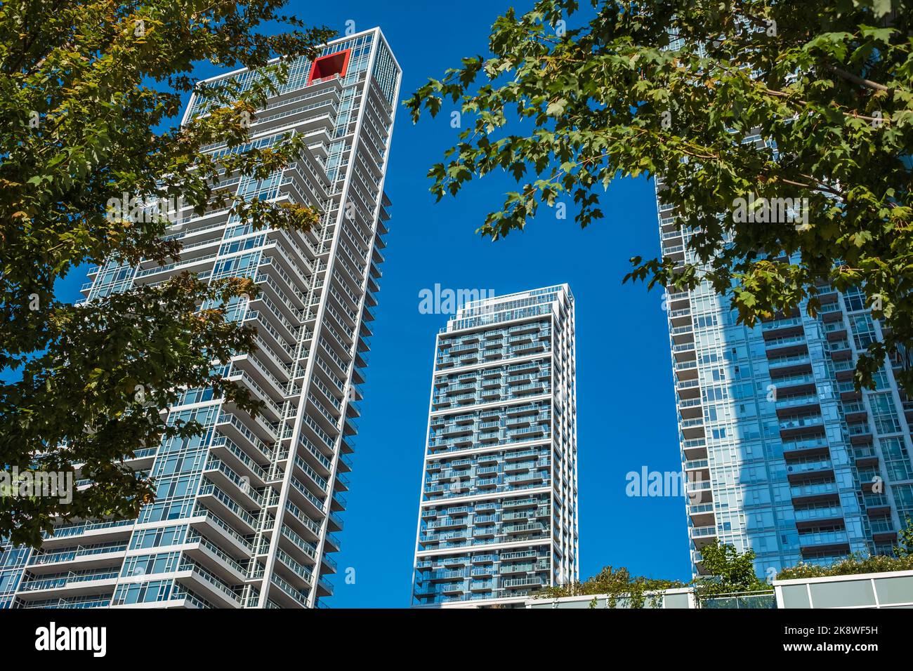 New modern high rise apartment complex in Vancouver BC. Bottom up view ...