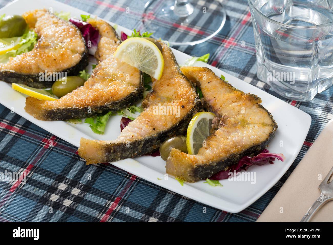 Tasty fish dish - roasted sturgeon Stock Photo - Alamy