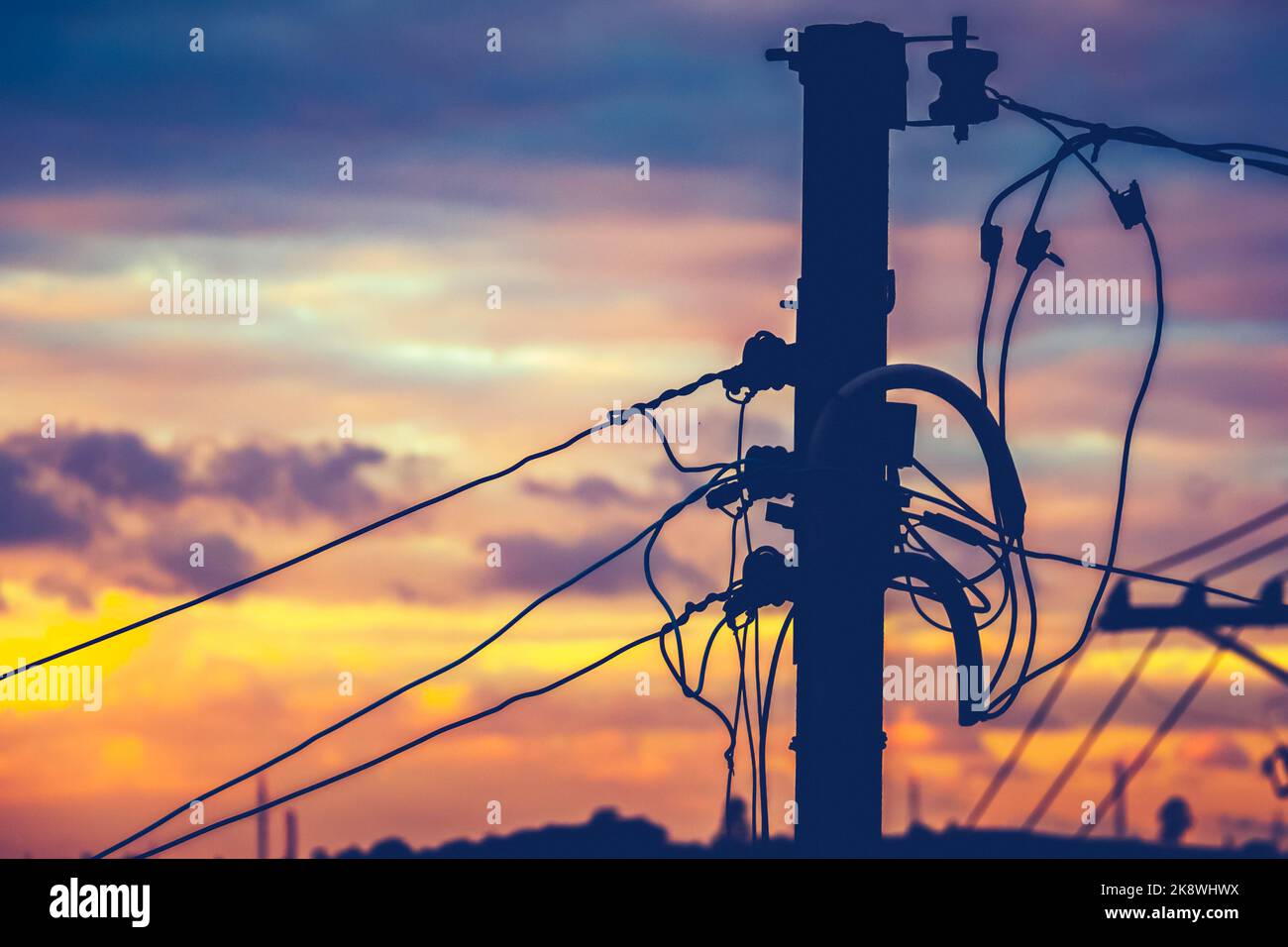 Sunset and Silhouette of a street lamp post Stock Photo - Alamy
