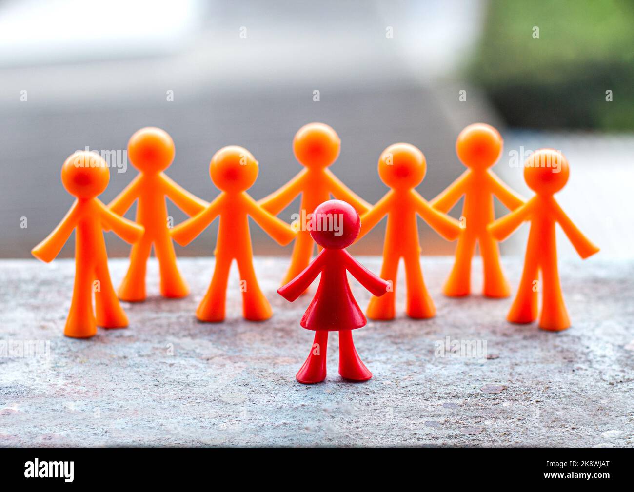 Representation of a work team and a leader through dolls Stock Photo ...