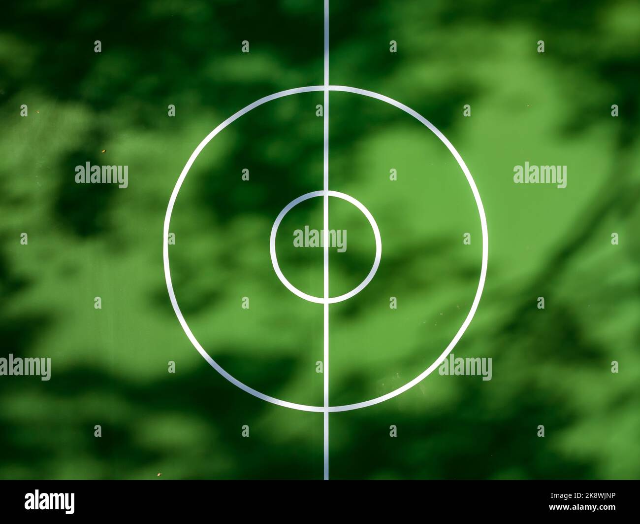 Aerial photo of a green and red outdoor basketball court at school ...