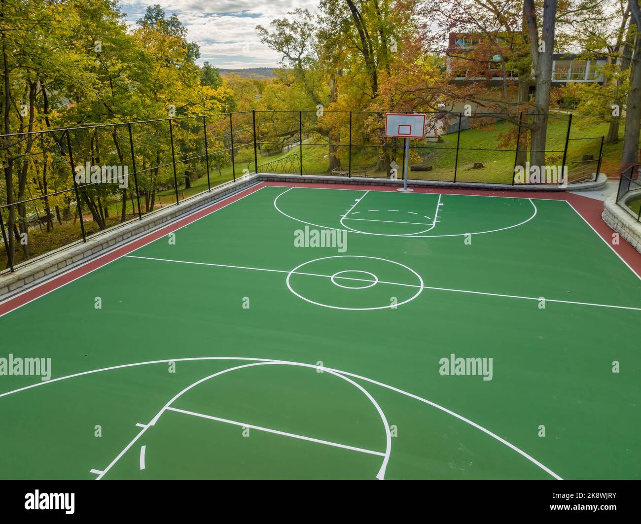 Aerial photo of a green and red outdoor basketball court at school ...