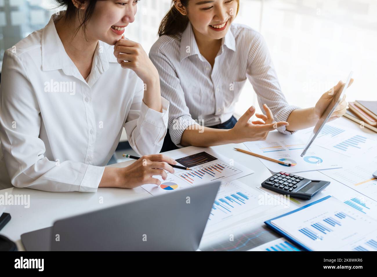 Negotiation, Analysis, Discussion, Asian woman economist and marketer ...