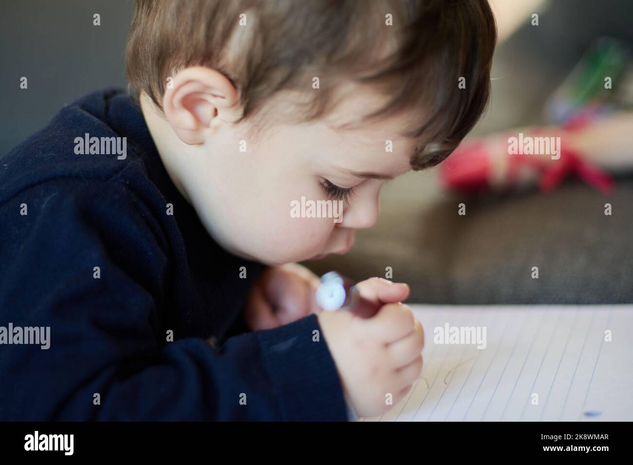 cute boy drawing on paper close up Stock Photo - Alamy