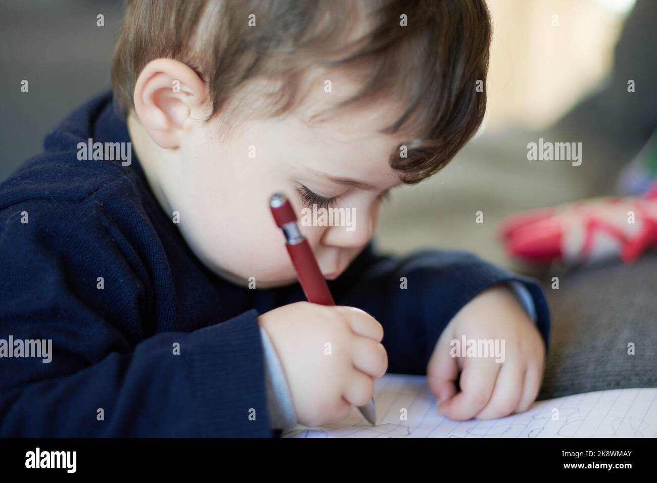 cute boy drawing on paper close up Stock Photo - Alamy