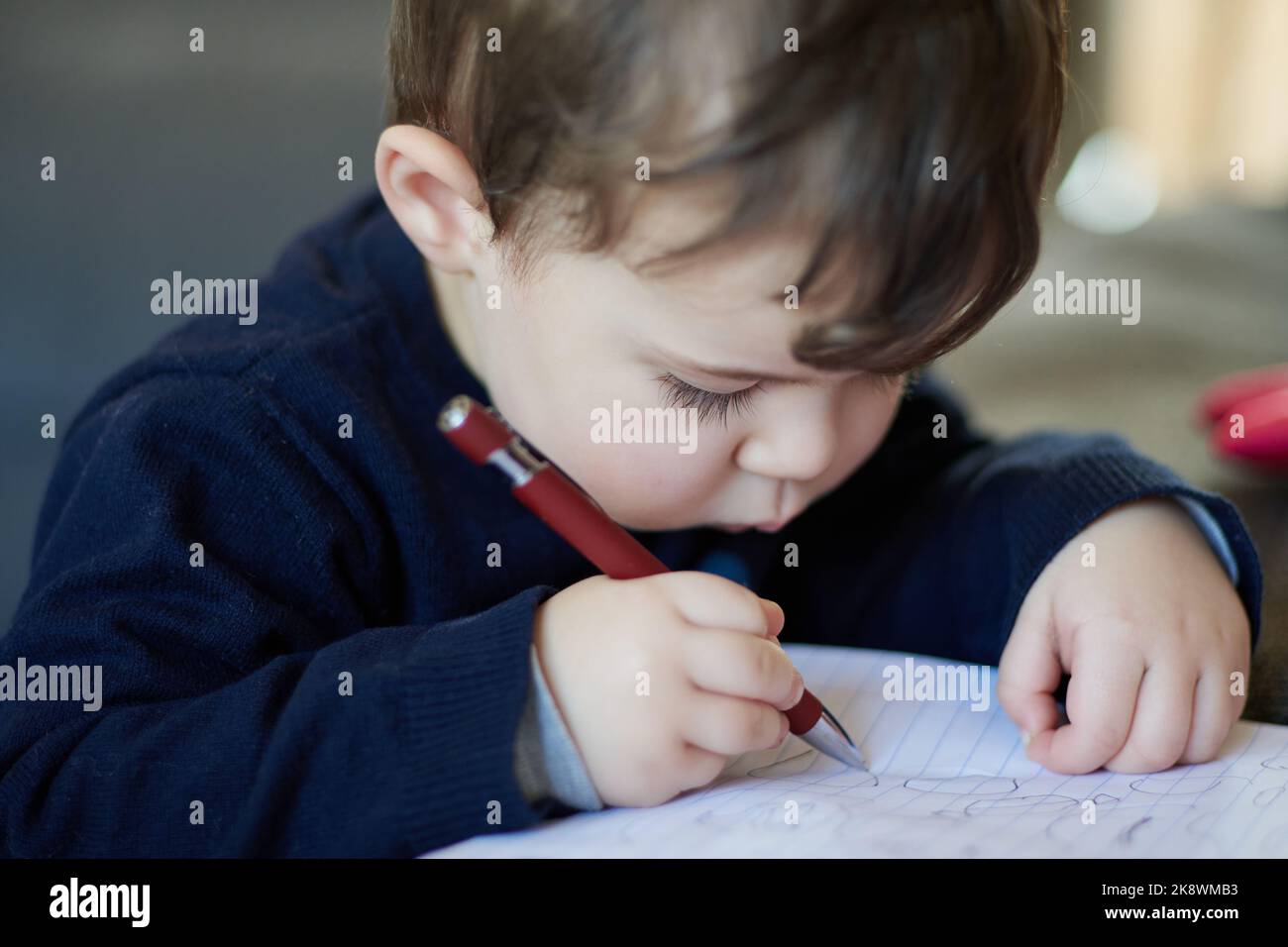 cute boy drawing on paper close up Stock Photo - Alamy