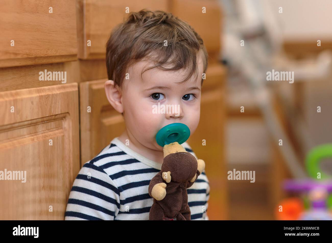 portrait of a boy toddler with a pacifier at home Stock Photo - Alamy