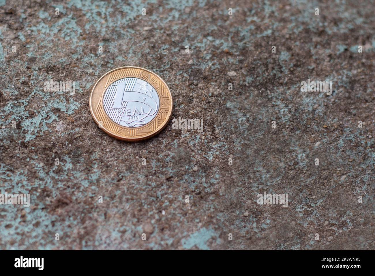 Featured 1 Brazilian real coin. Real is the currency system of the ...