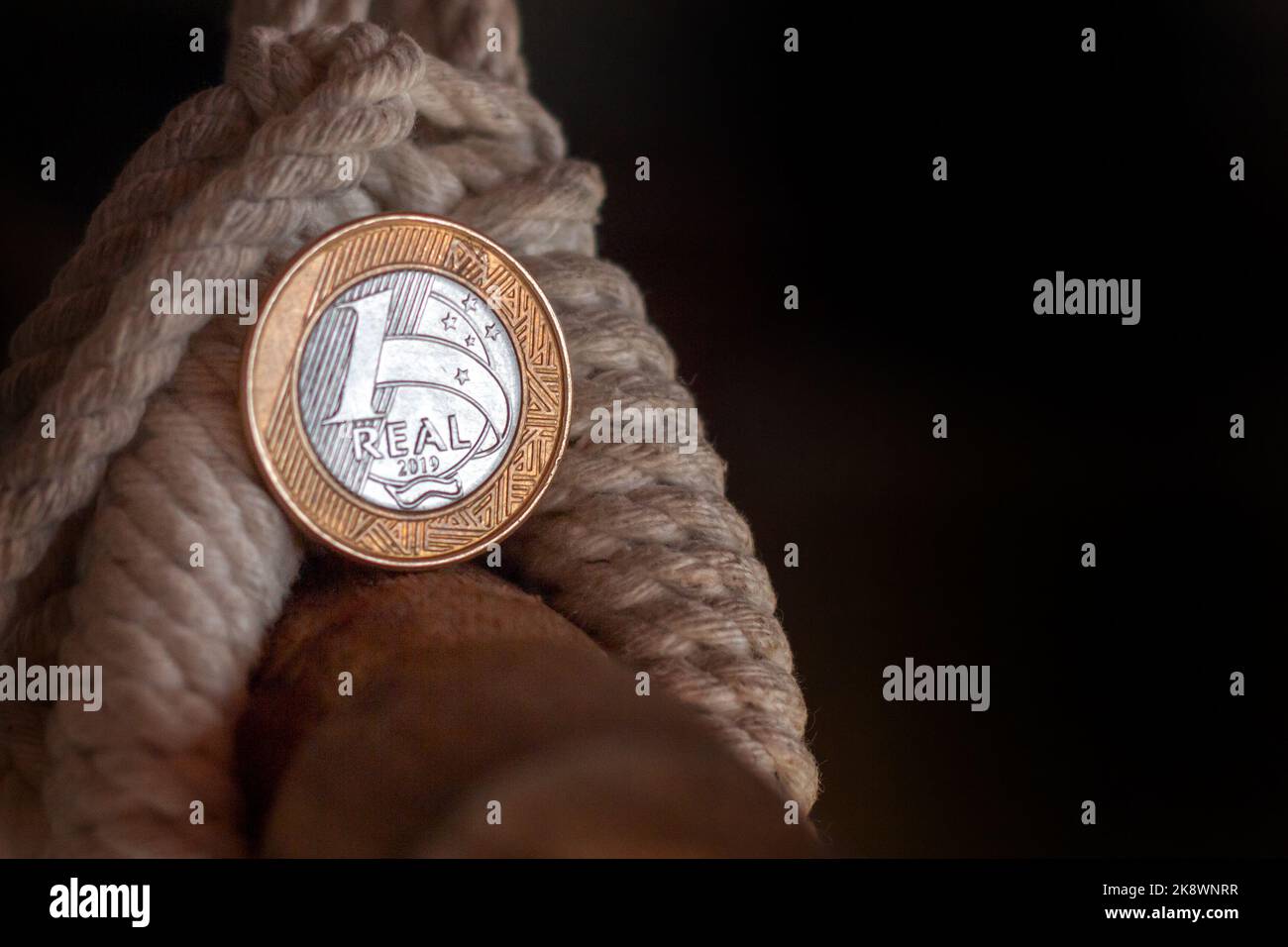 Featured 1 Brazilian real coin. Real is the currency system of the ...