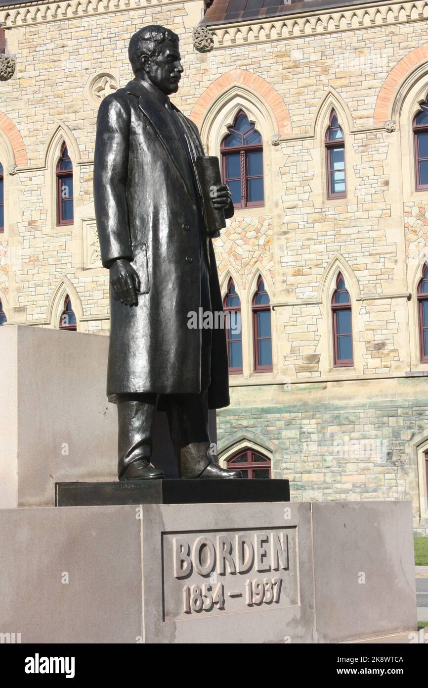 Buildings on Parliament Hill in Ottawa, Ontario, Canada with a statue ...