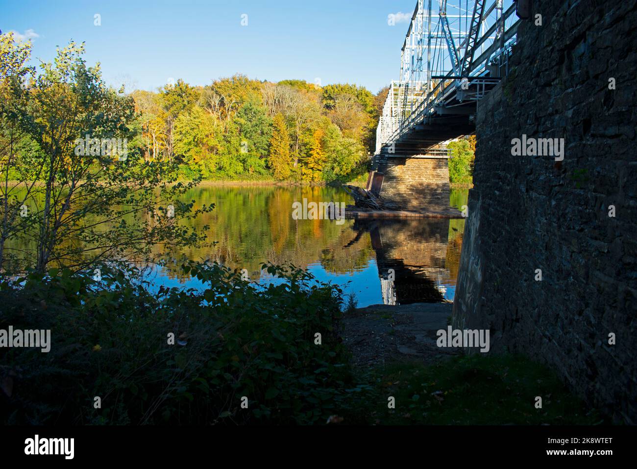 Autumn foliage and tree reflections at the Delaware River under Dingman ...