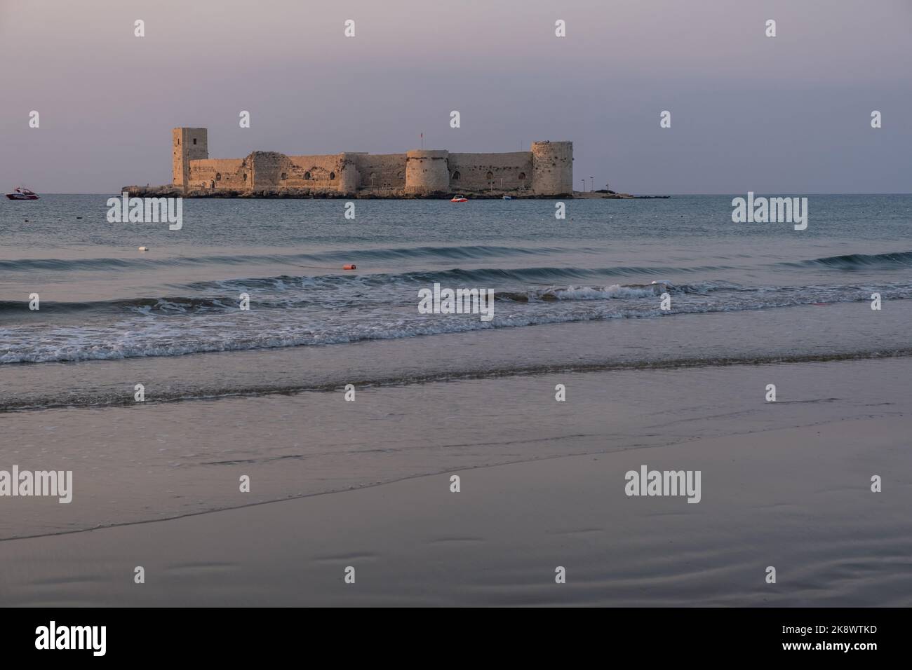 Kizkalesi or Maiden Castle near Mersin on a small island at sunrise ...