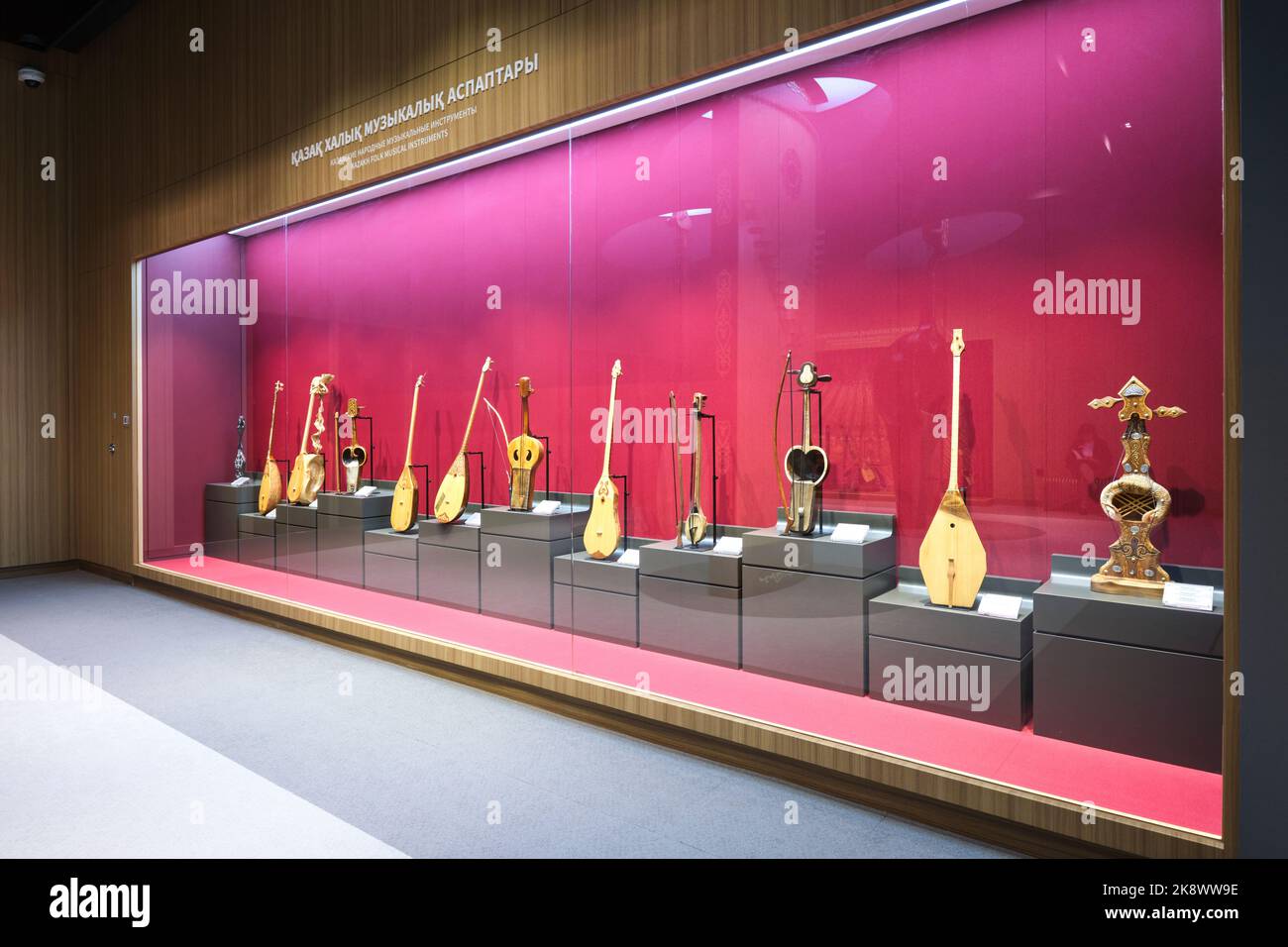 An exhibit, showing various wood and stringed traditional musical ...