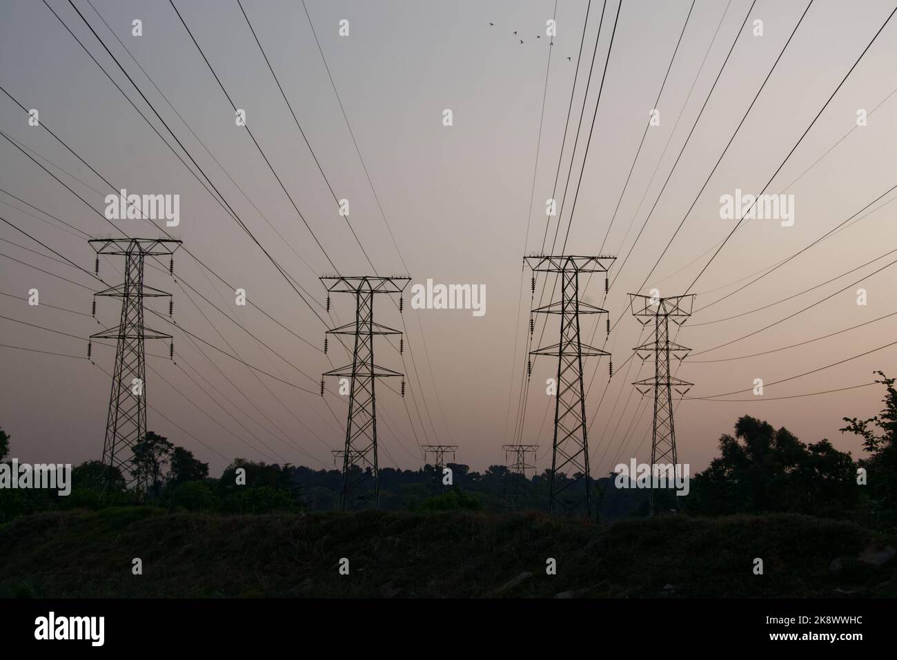 Overhead Electrical Cables carried by electricity pylons with cables ...