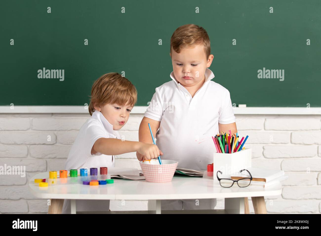 Children boys draws with paints. Kids artist creativity. Little artist ...