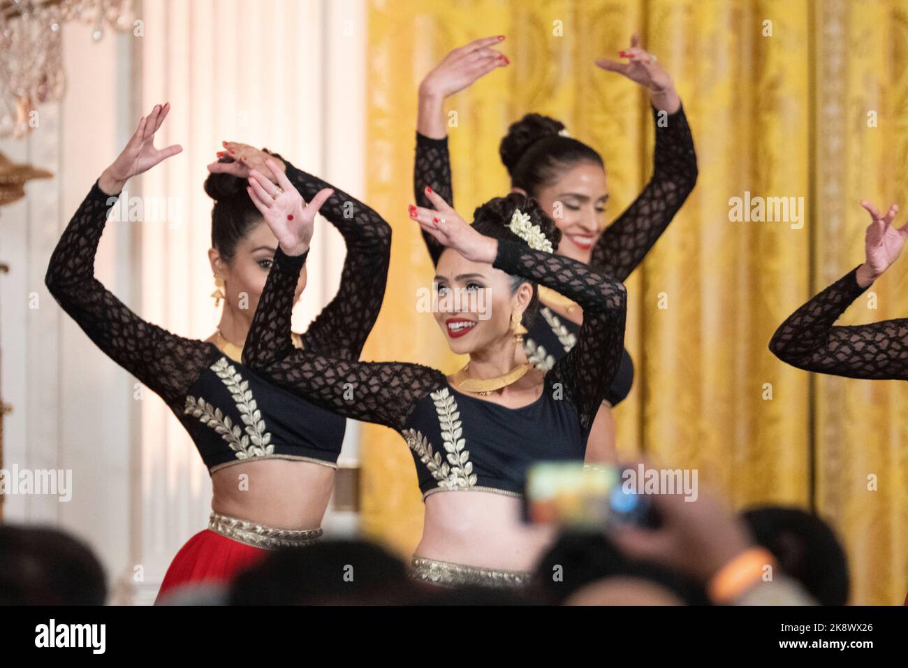 Dancers perform at a reception to celebrate Diwali in the East Room of ...