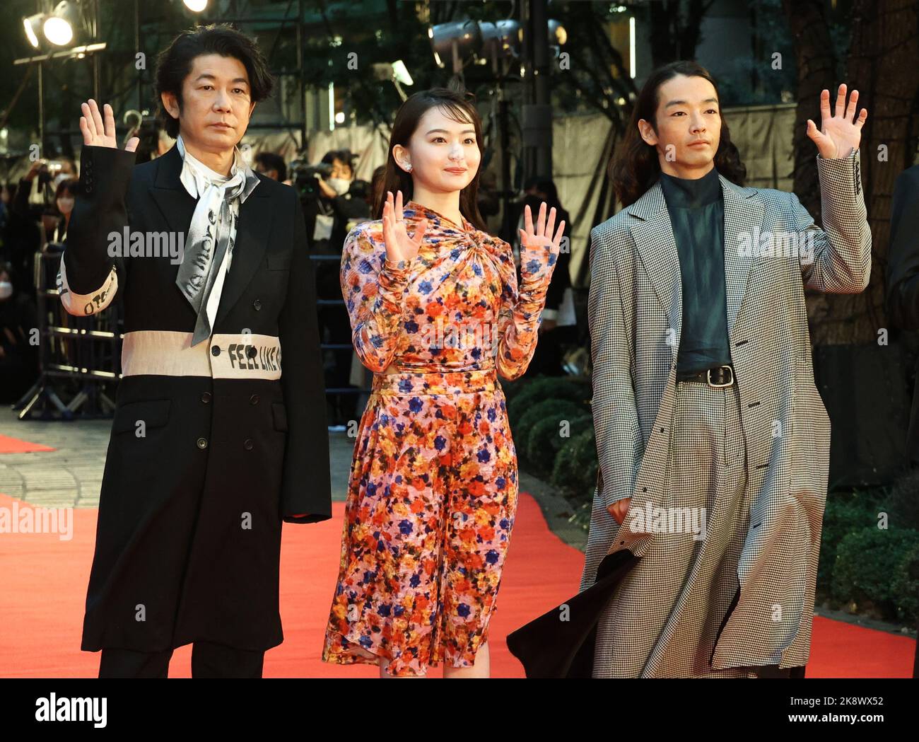 Tokyo, Japan. 24th Oct, 2022. Japanese actor Masatoshi Nagase (L), actress Anna Yamada (C) and ...
