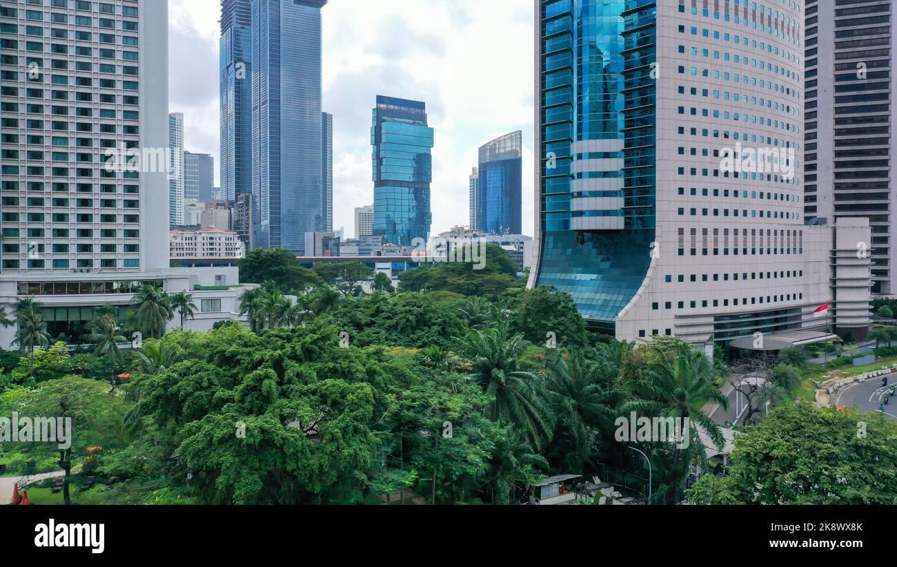Aerial view of blue glass modern high rise building in business ...