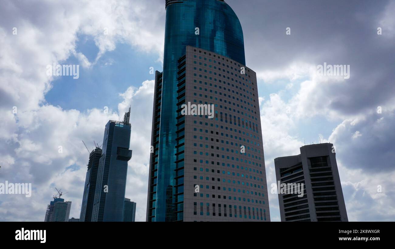 Aerial view of blue glass modern high rise building in business ...