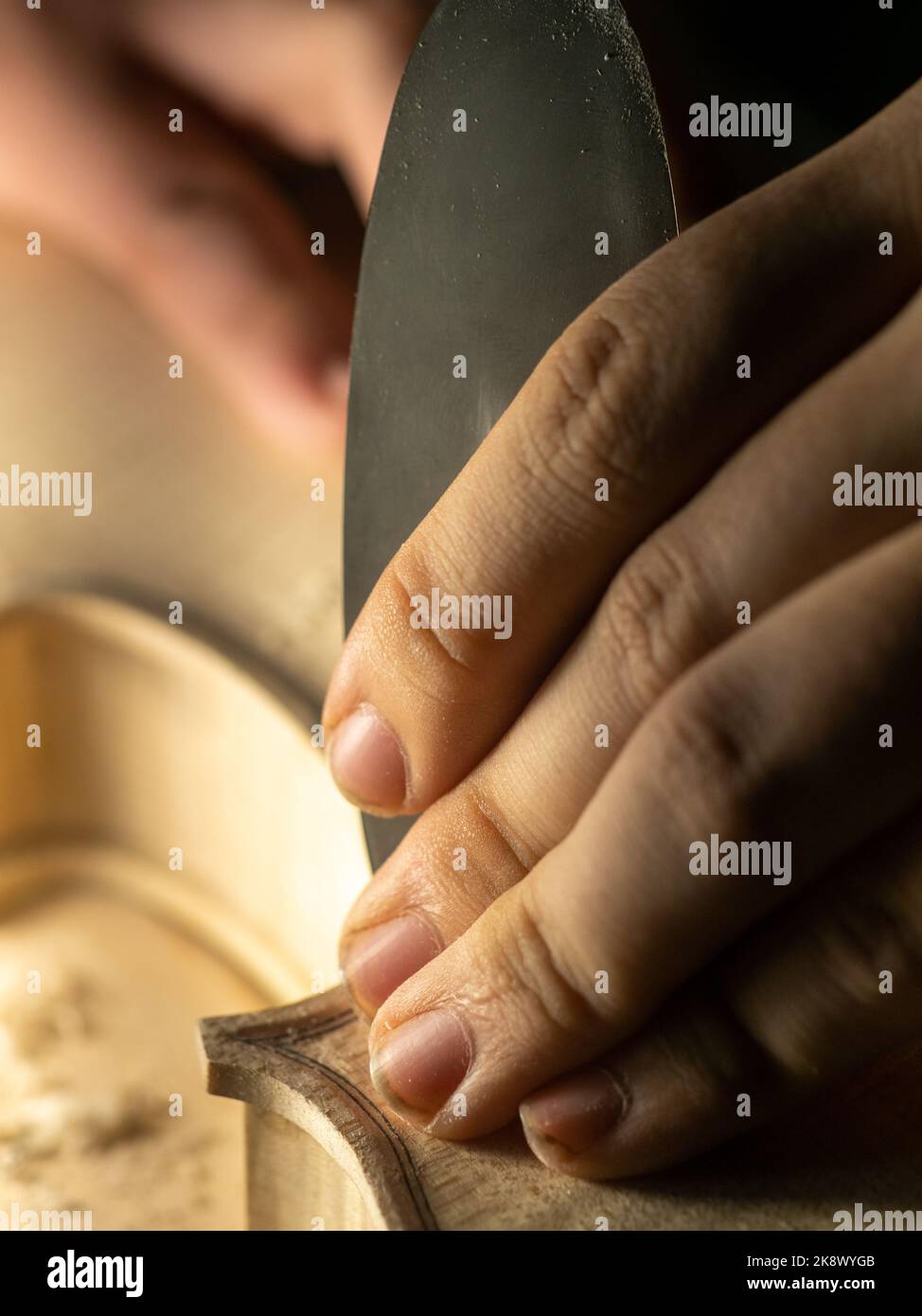 smoothing fiddle table on maker workbench Stock Photo - Alamy