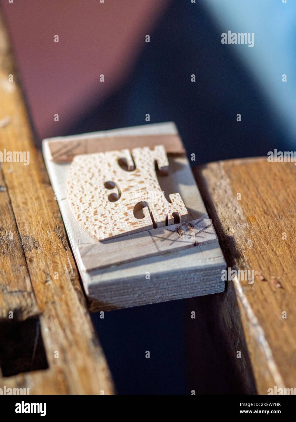 stringed instrument bridge shaping and fining Stock Photo - Alamy